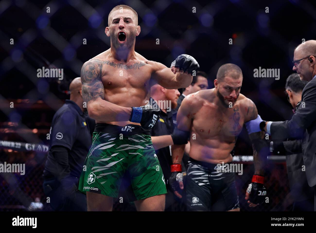 Wales' Oban Elliott reacts after defeating Bassil Hafez, right, in a ...