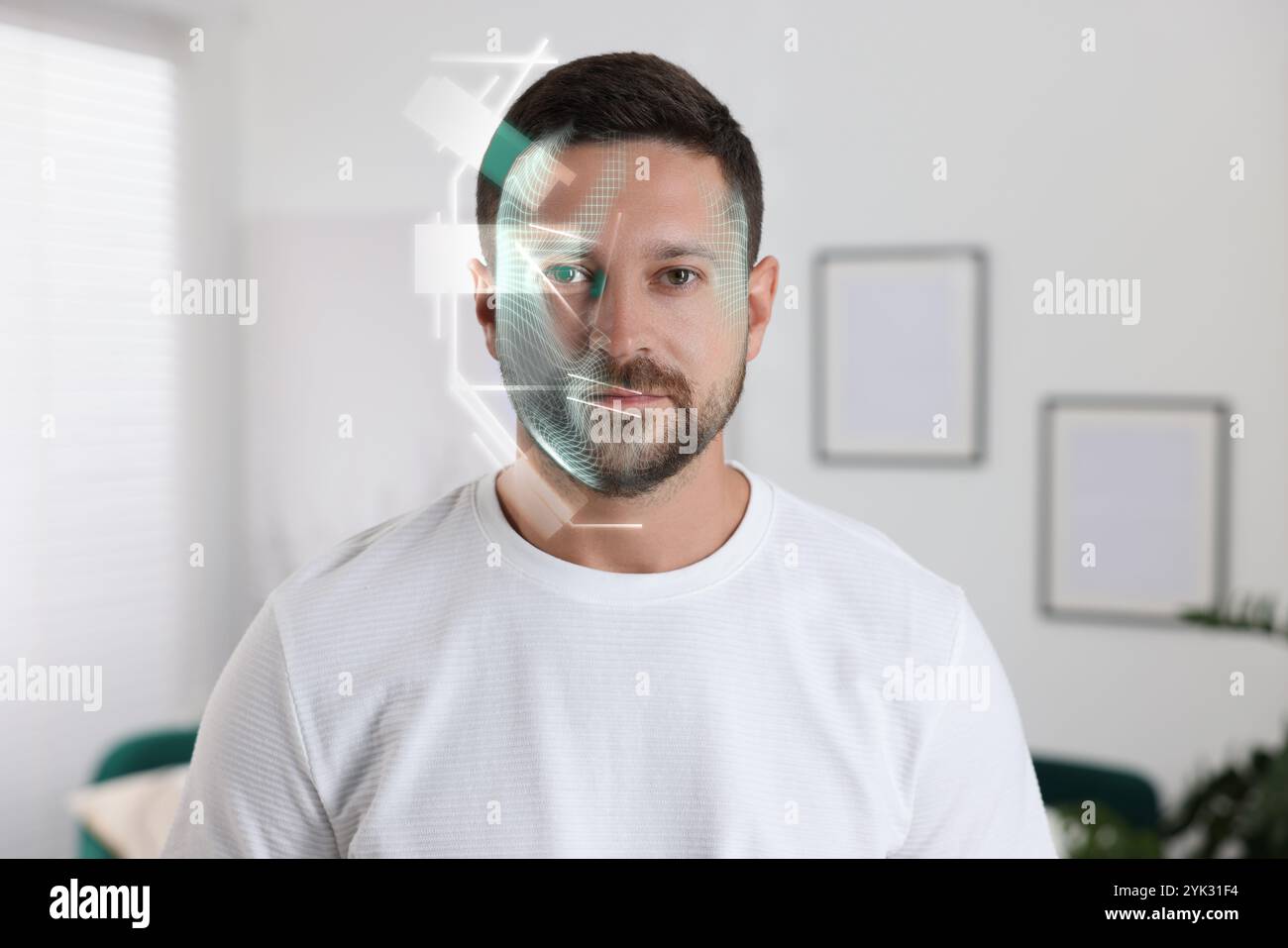 Facial recognition system. Man undergoing biometric verification at ...
