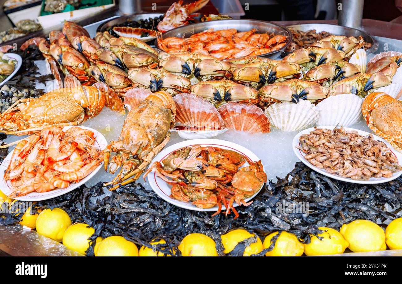 Seafood of all kinds on display at the fish market (Poissonerie) in ...