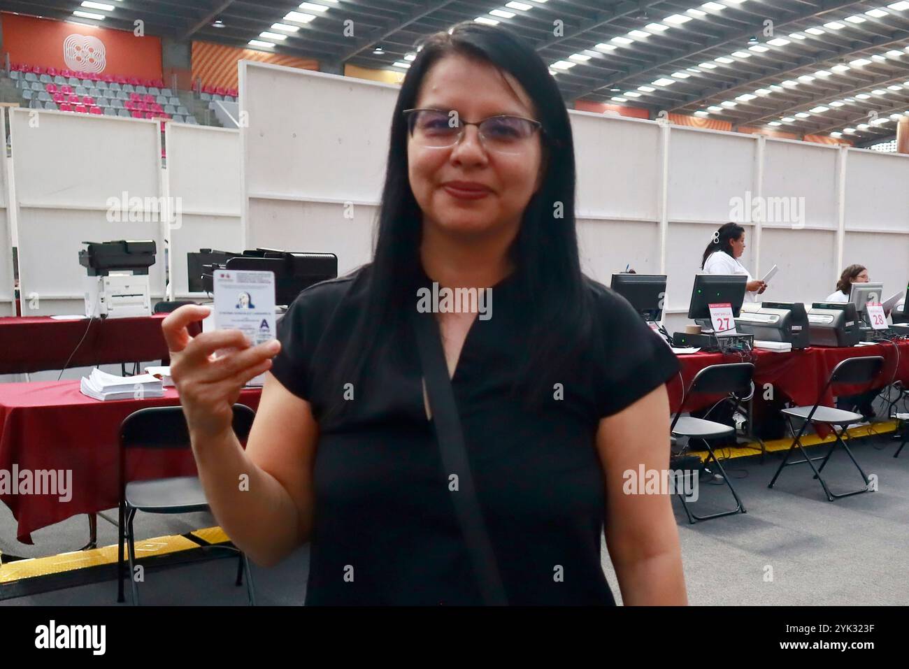 Mexico City, Mexico. 16th Nov, 2024. A person shows his new permanent ...