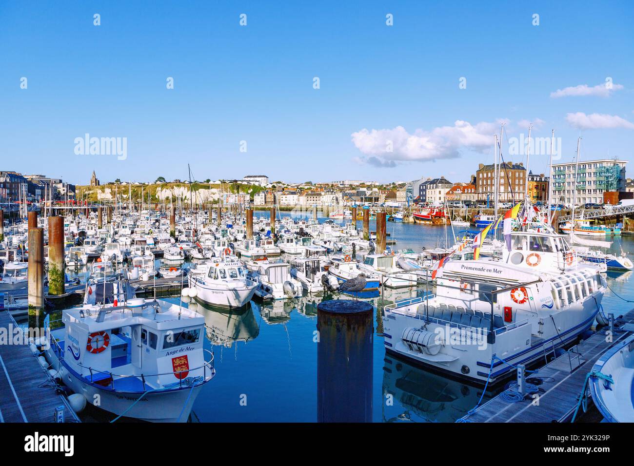 Port Plaisance harbor with colorful fishing boats and yachts at low ...