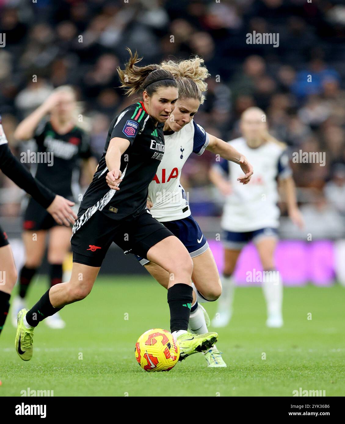 London, Britain. 16th Nov, 2024. Arsenal's Mariona Caldentey (L) vies ...