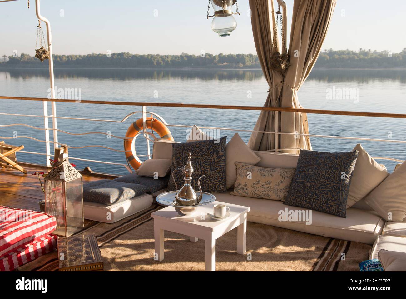 lounge on the deck of a Dahabeah,passenger river boat of the Lazuli ...