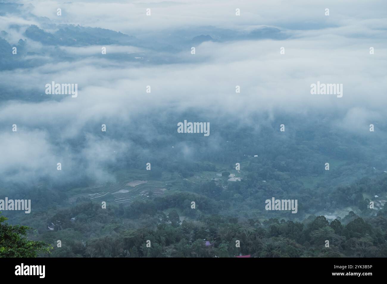 View of Rantepao city covered in fog seen from the top of Mount Lolai ...