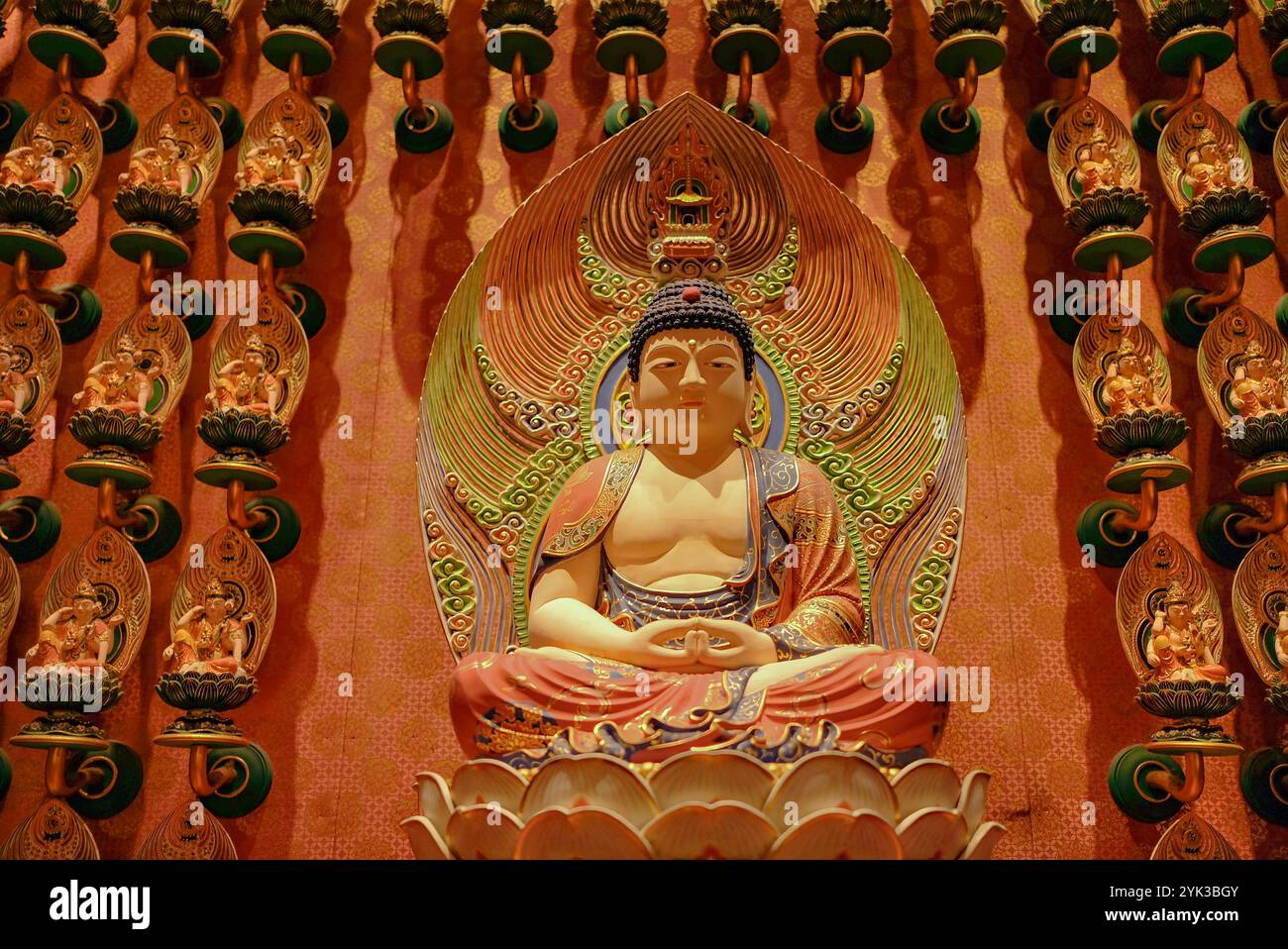 Close up of Akasagarbha Bodhisattva deity statue surrounded by a wall ...