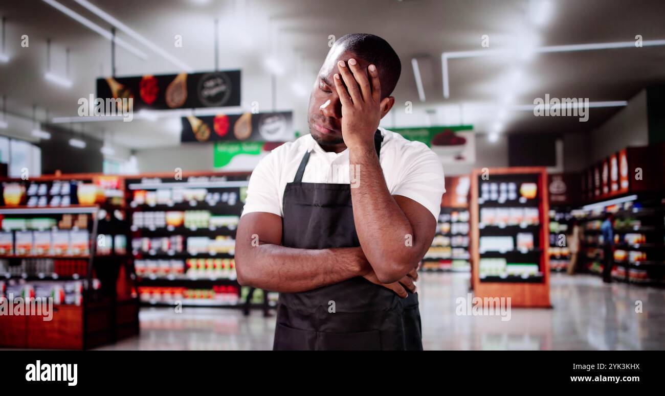Sad Tired Supermarket Store Employee Worker. Grocery Shop Stock Photo ...