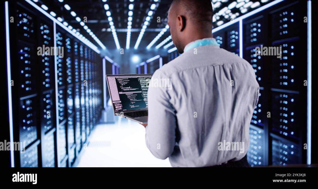 Happy Engineer In Data Center Server Room Configuring AI Technology Stock Photo - Alamy