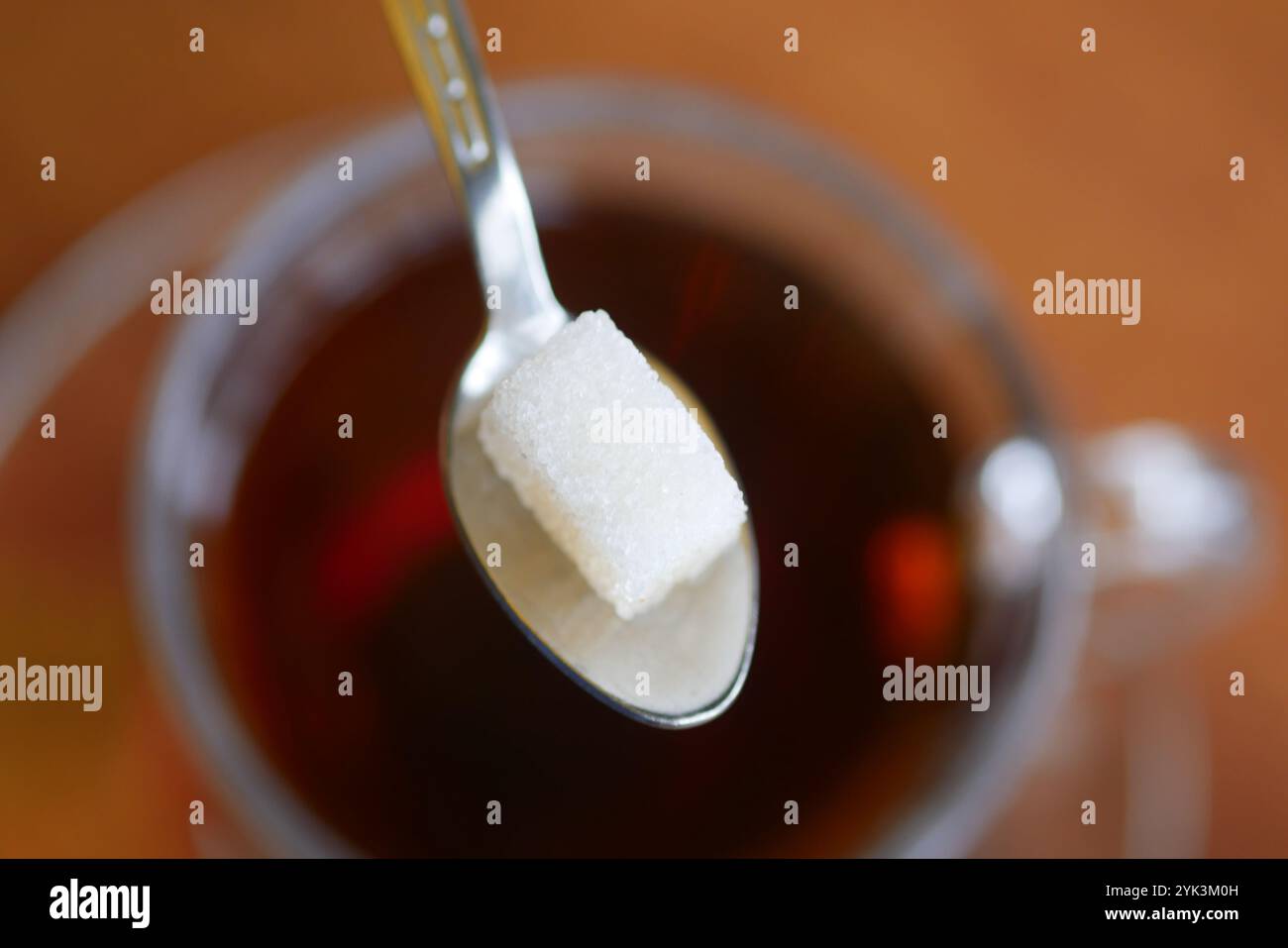 A Sugar Cube Balancing Gracefully Over a Warm Cup of Tea Waiting for ...