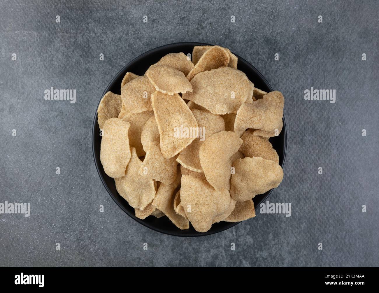 Kerupuk udang - traditional indonesian shrimp crackers on a gray ...