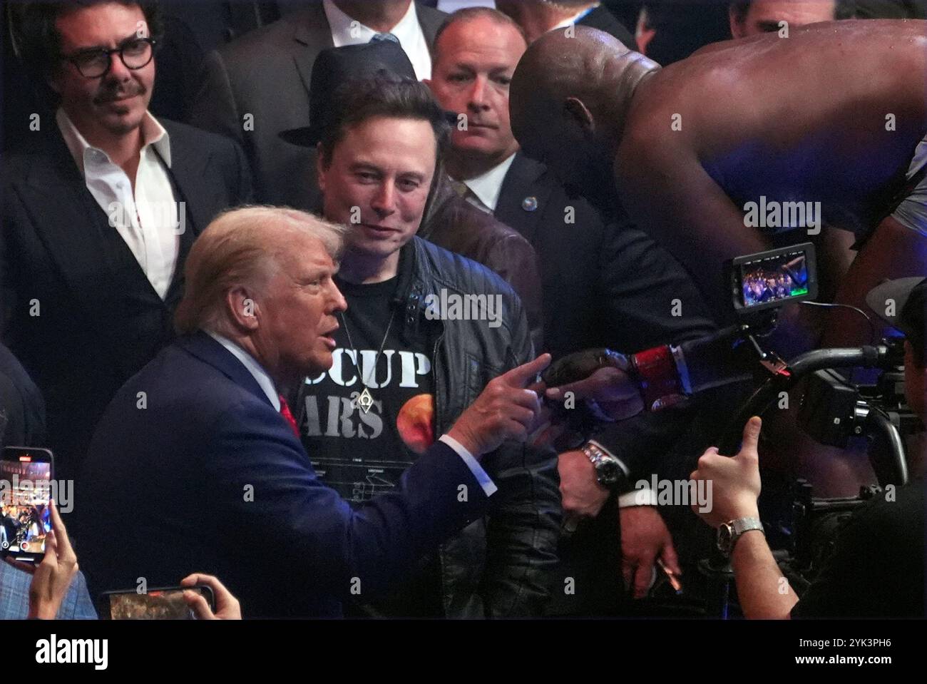 President-elect Donald Trump greets Jon Jones after he defeated Stipe ...