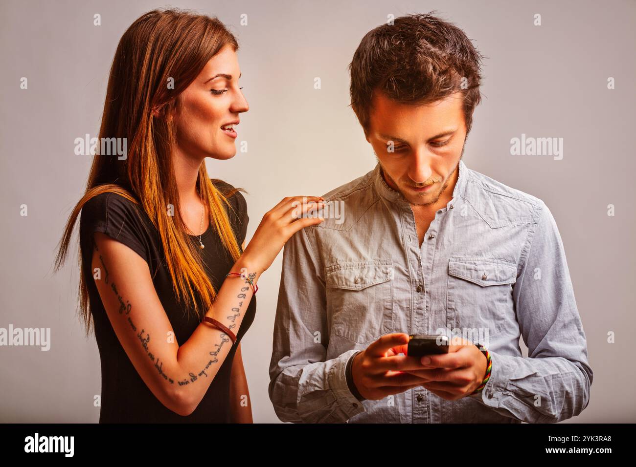 Two people appear on screen hi-res stock photography and images - Alamy