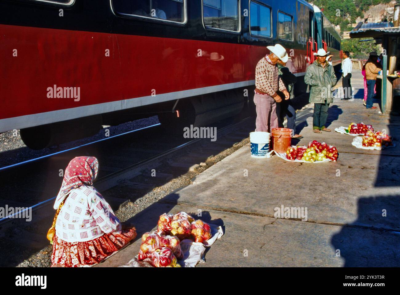Vendors selling fruit at train platform at Divisadero station, Copper ...