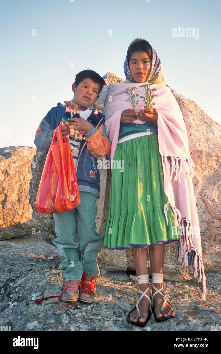 Young girl and boy, Tarahumara children, selling souvenirs at Valle de ...