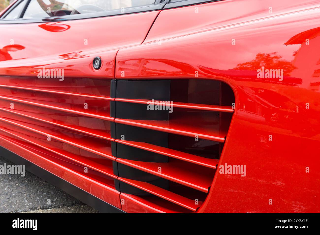 Close up detail of the side strake air intakes on a rosso corsa red ...