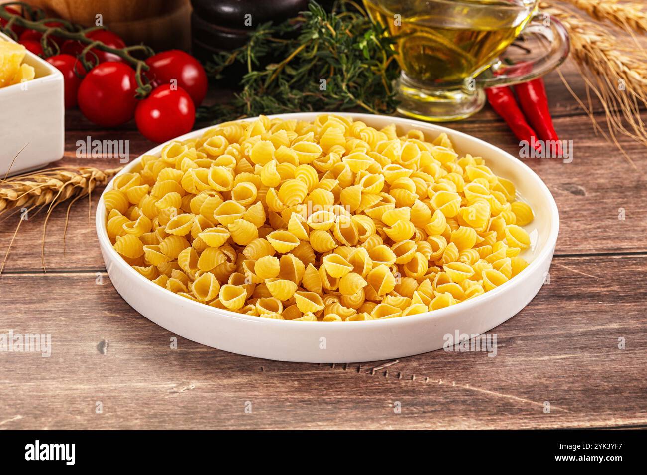 Italian cuisine - dry conchiglie shell pasta Stock Photo - Alamy