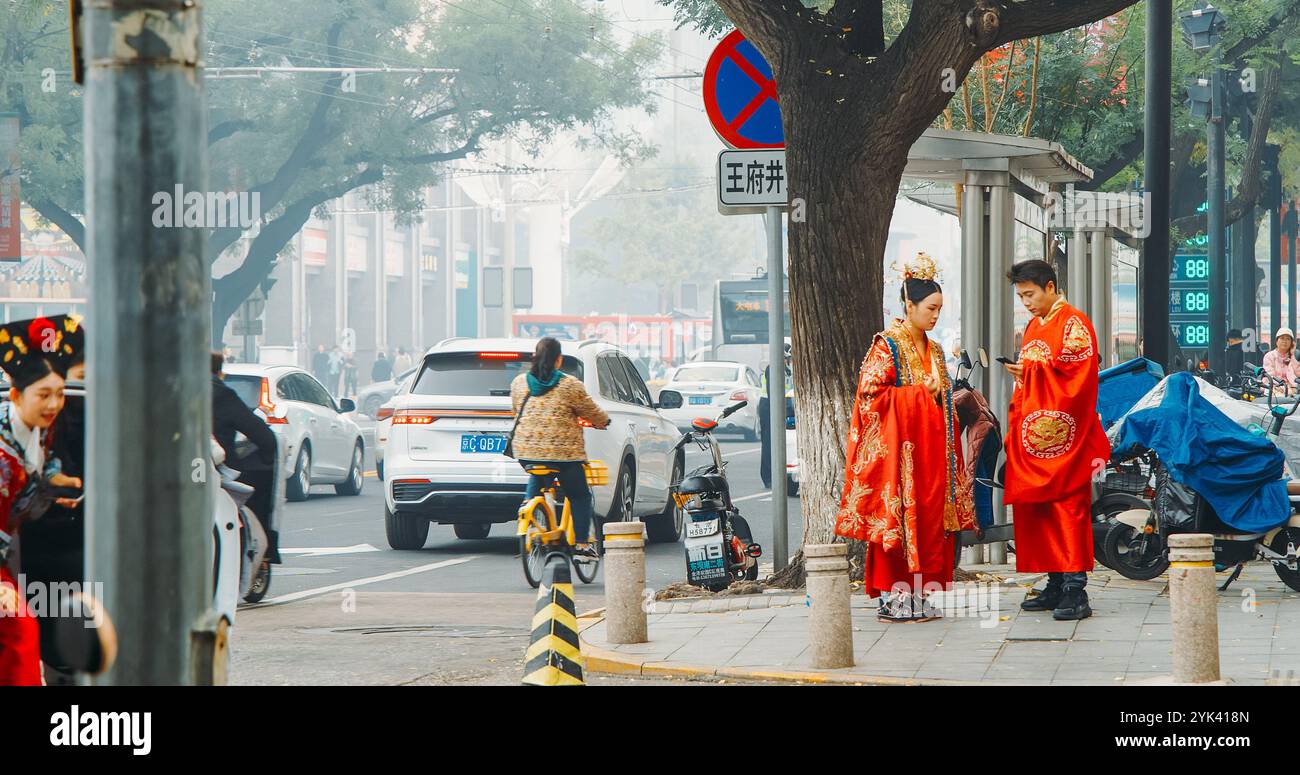 Beijing, China. People In Traditional Chinese Clothes At Street In ...