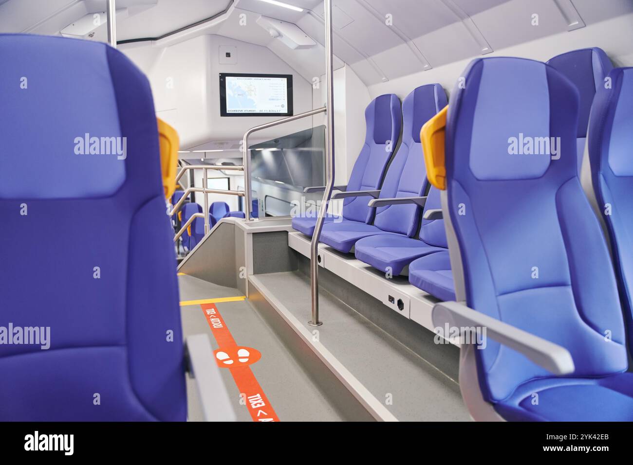Modern high speed train interior with empty blue seats Stock Photo - Alamy