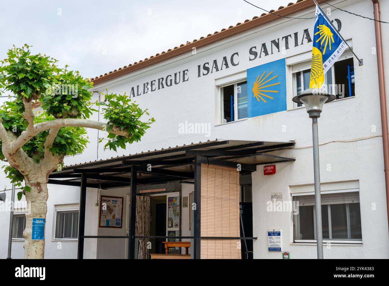 Los Arcos, Spain- May 25, 2024: The front of Albergue Isaac Santiago on ...