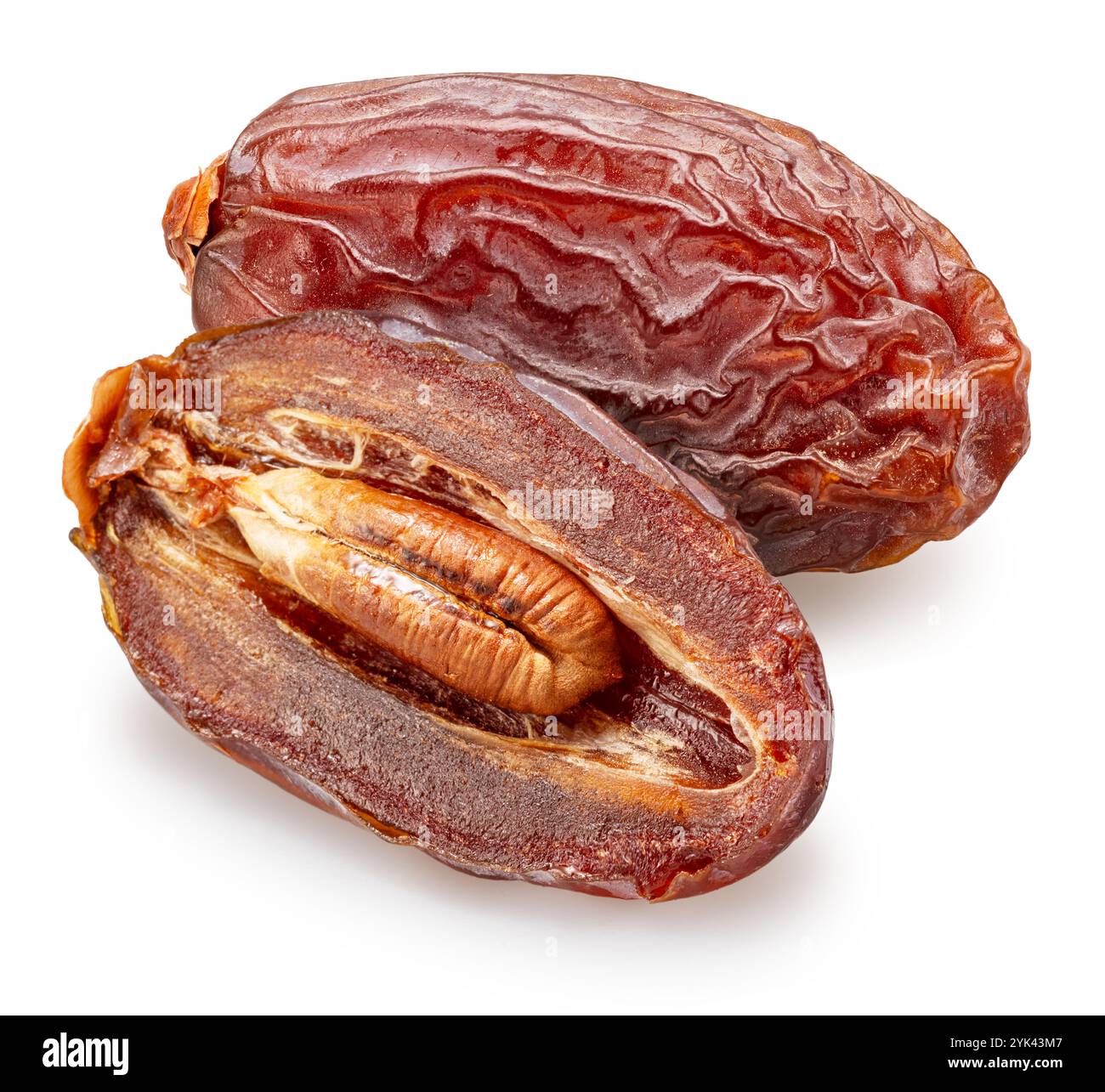 Semi-dried date and date fruit cut in half isolated on white background ...