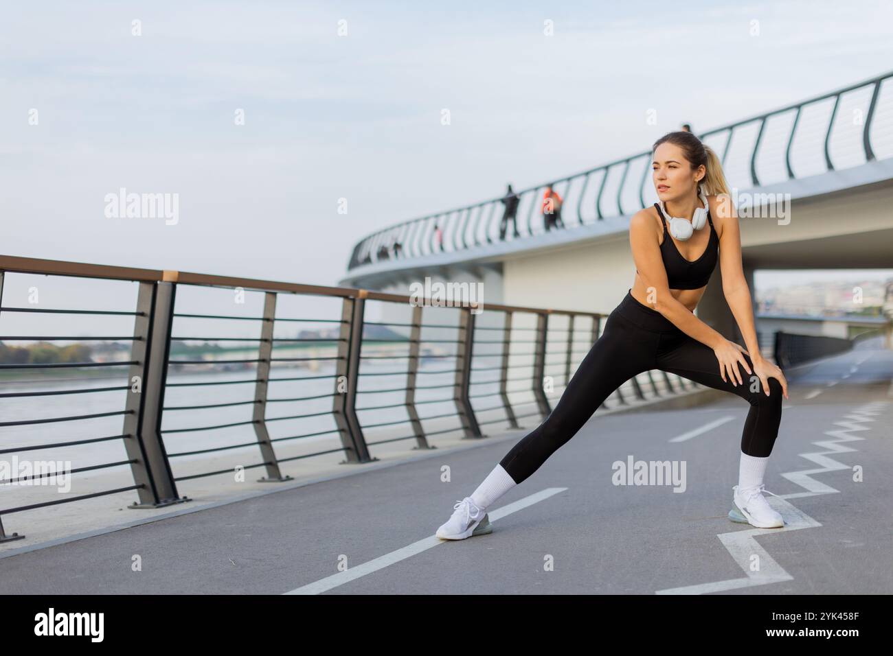 Athletic woman walking on pathway hi-res stock photography and images ...