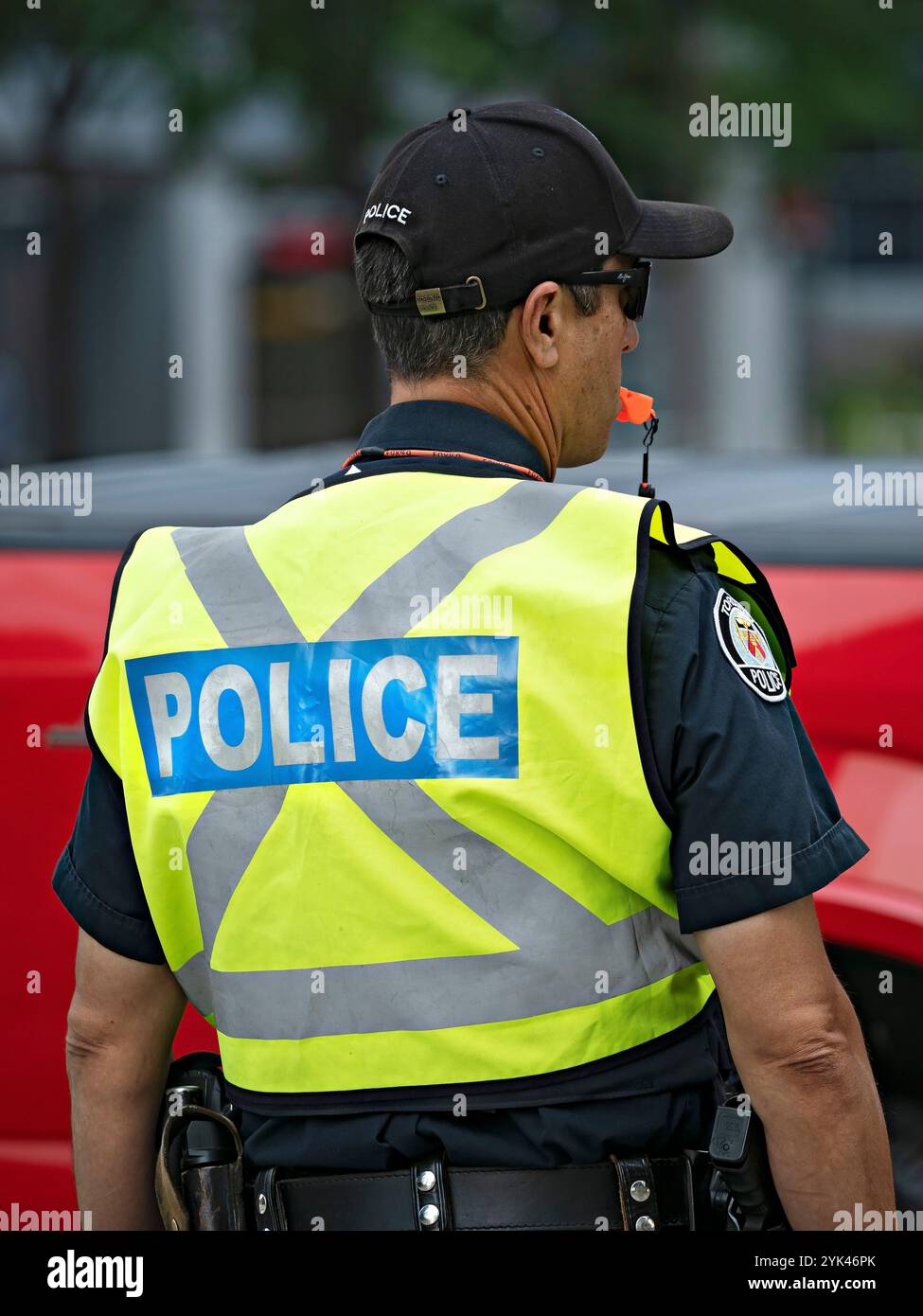 Toronto Canada / Toronto Policeman directing traffic in Downtown ...