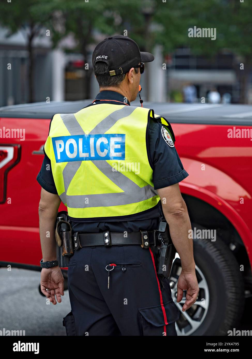Toronto Canada / Toronto Policeman directing traffic in Downtown ...