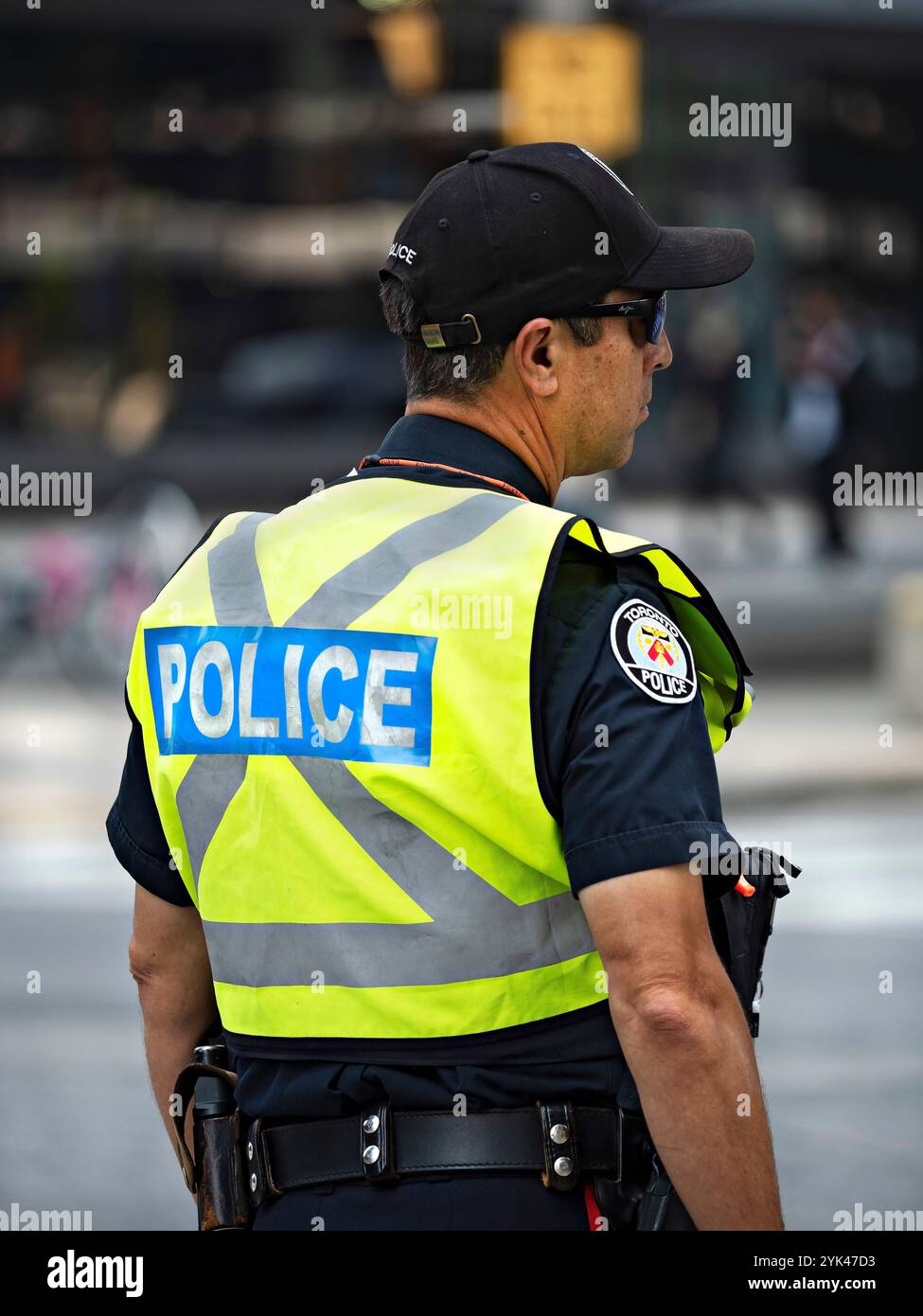 Toronto Canada / Toronto Policeman directing traffic in Downtown ...