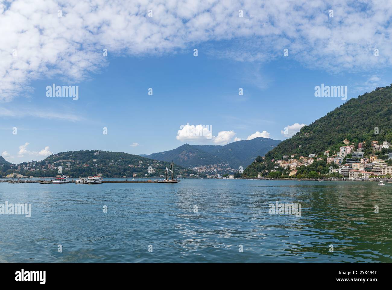A picture of the edge of Lake Como as seen from the city of Como. Also ...