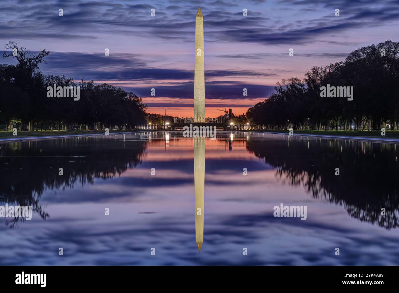 The famous Washington Monument before sunrise reflected in the famous ...