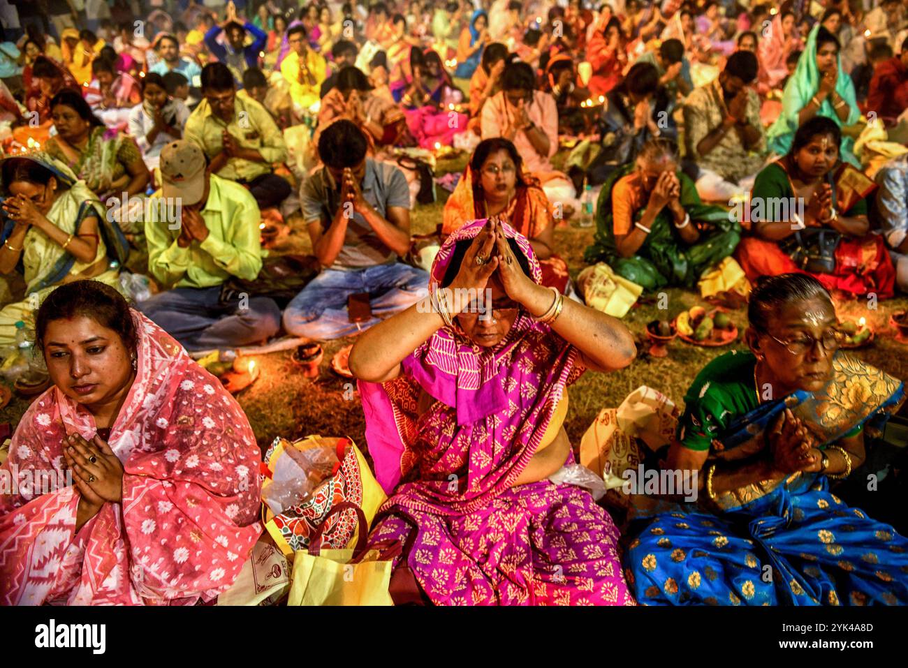 Hindu devotees seen praying to Shri Loknath Brahmachari, a Hindu saint ...