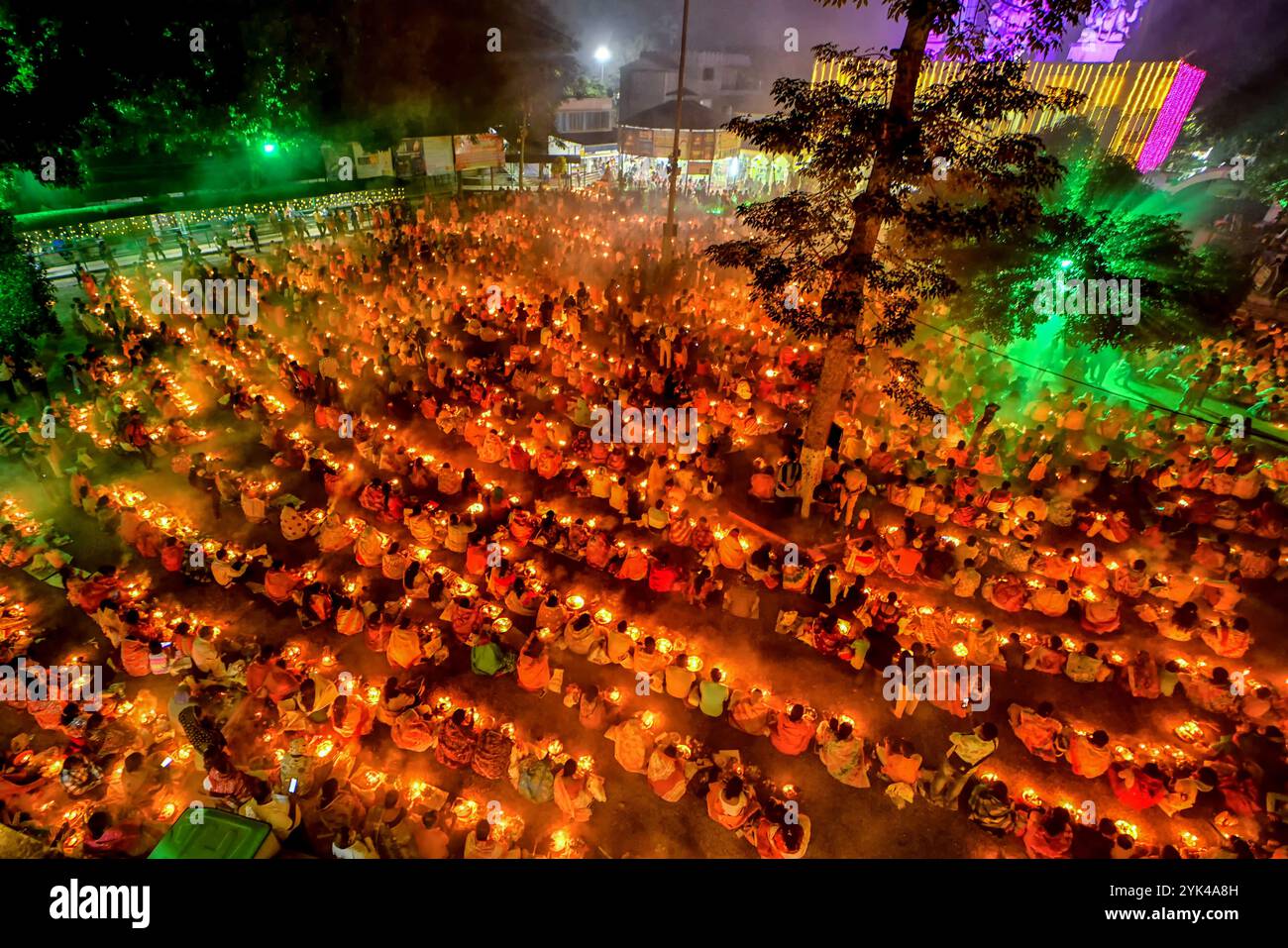 Thousand of Devotees seen offering prayers by lighting oil lamps and ...