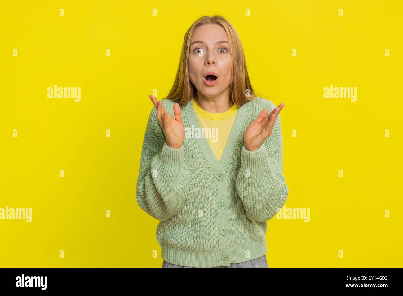 Oh my God, Wow. Excited amazed winner woman raising hands in surprise ...