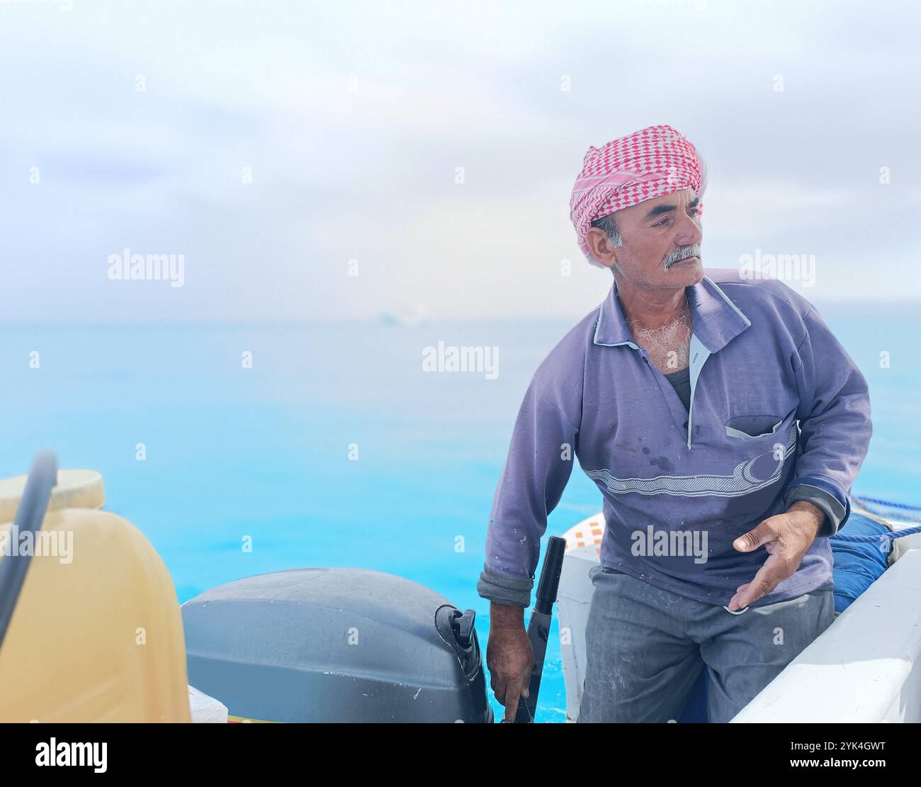 Old Sailor in the Sea Riding and Sailing with his Boat An old sailor ...
