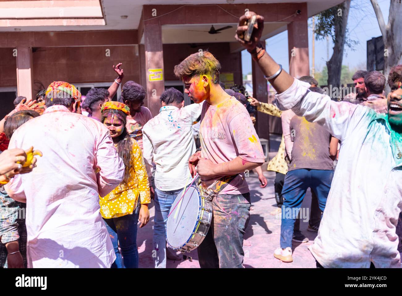 Group of hindu people with colors of their faces celebrating the ...