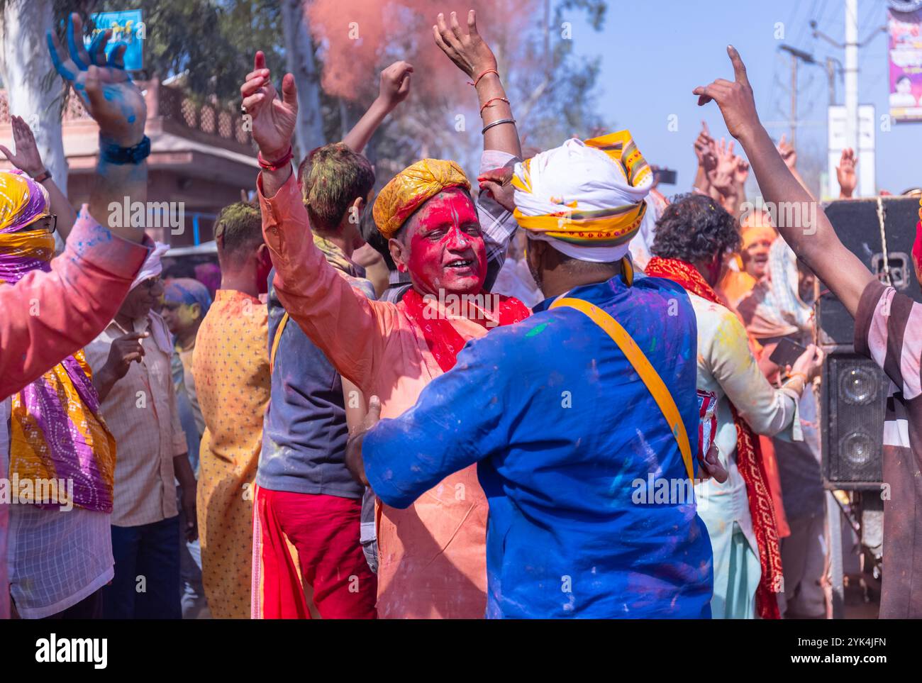 Group of hindu people with colors of their faces celebrating the ...