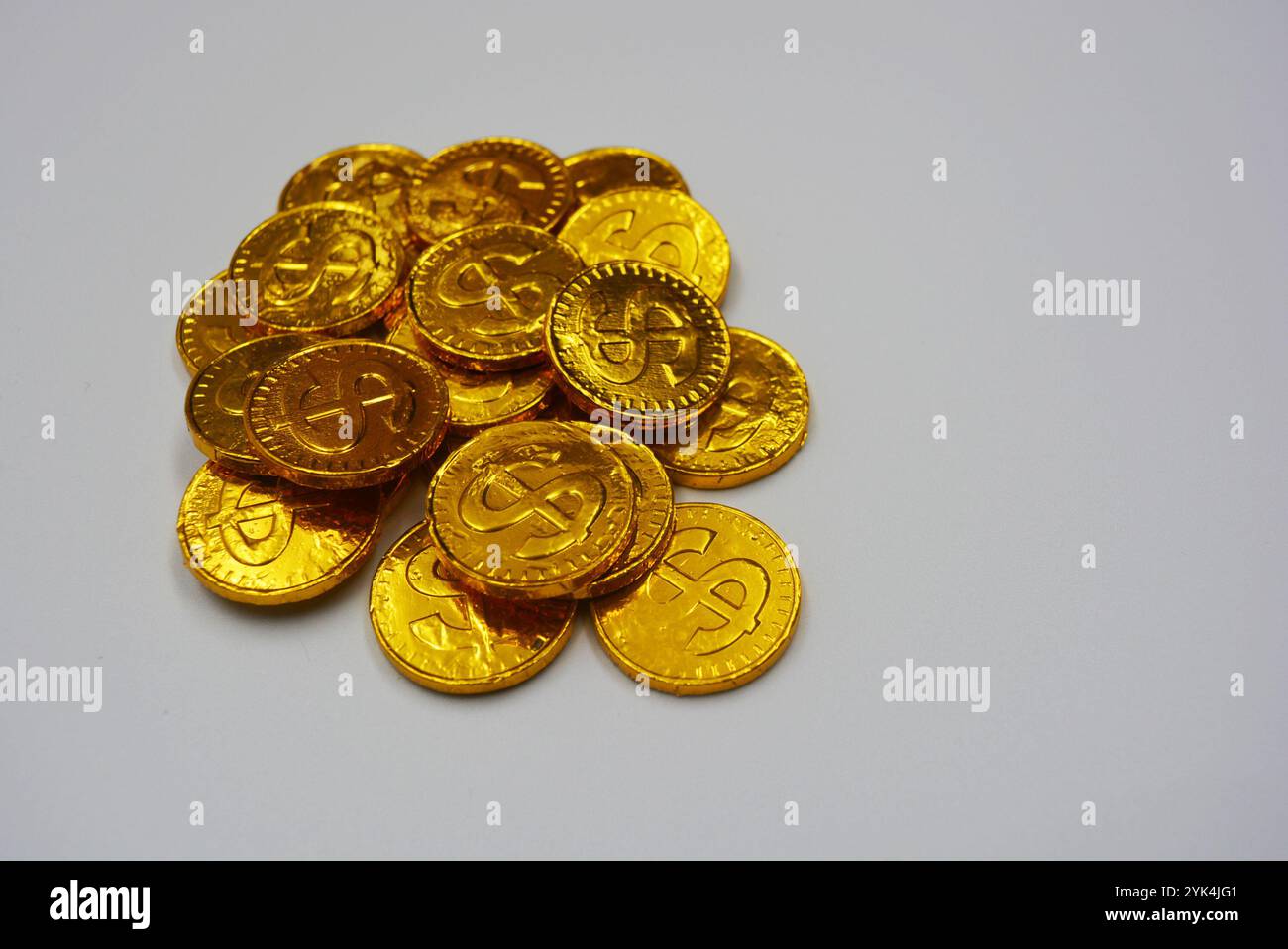 Beautiful, large gold coins, cents with a dollar $ sign are located on ...