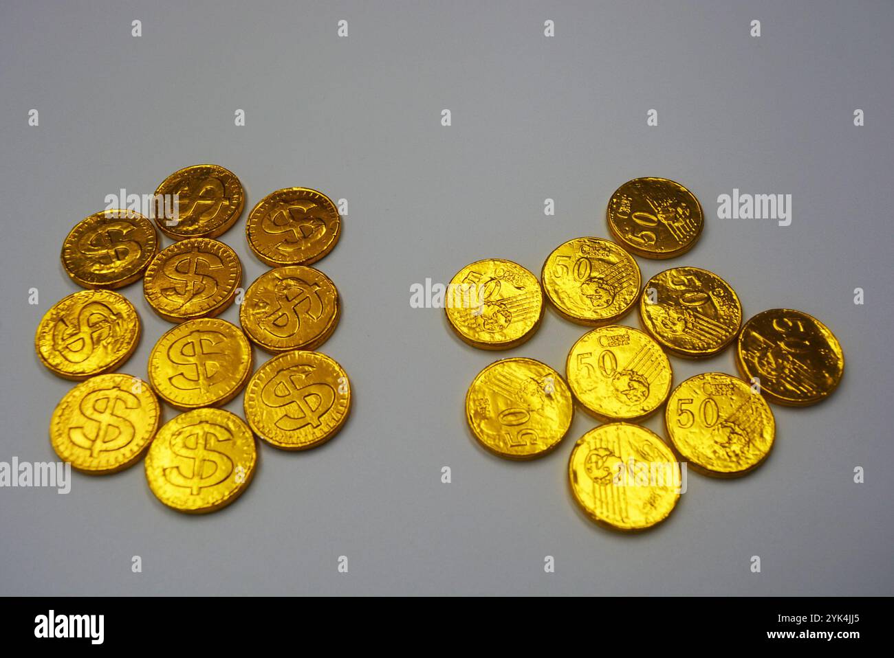 Beautiful, large gold coins, cents with a dollar $ sign are located on ...