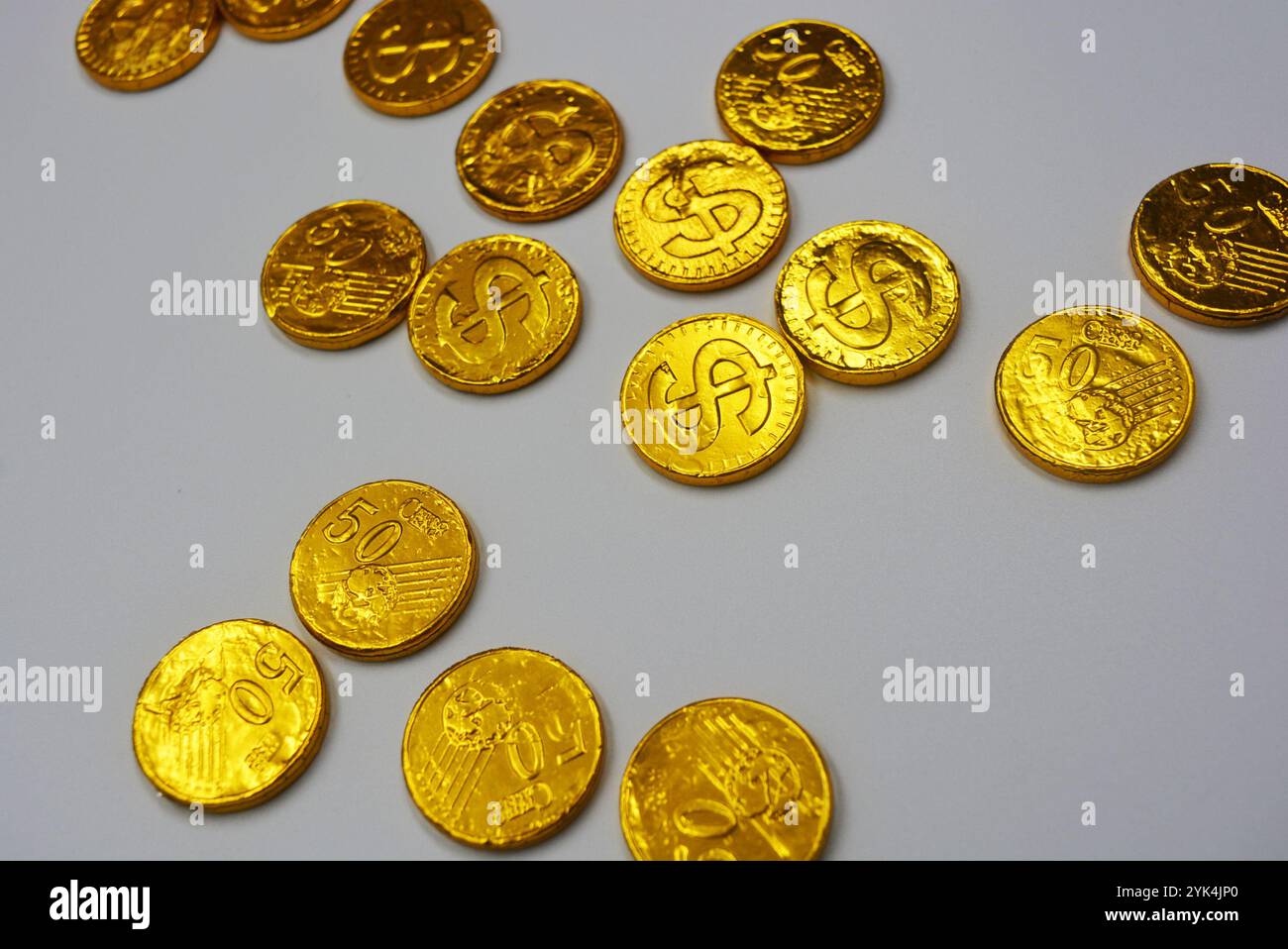 Beautiful, large gold coins, cents with a dollar $ sign are located on ...