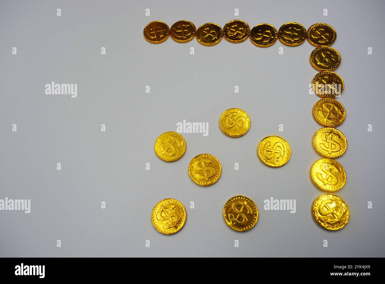 Beautiful, large gold coins, cents with a dollar $ sign are located on ...