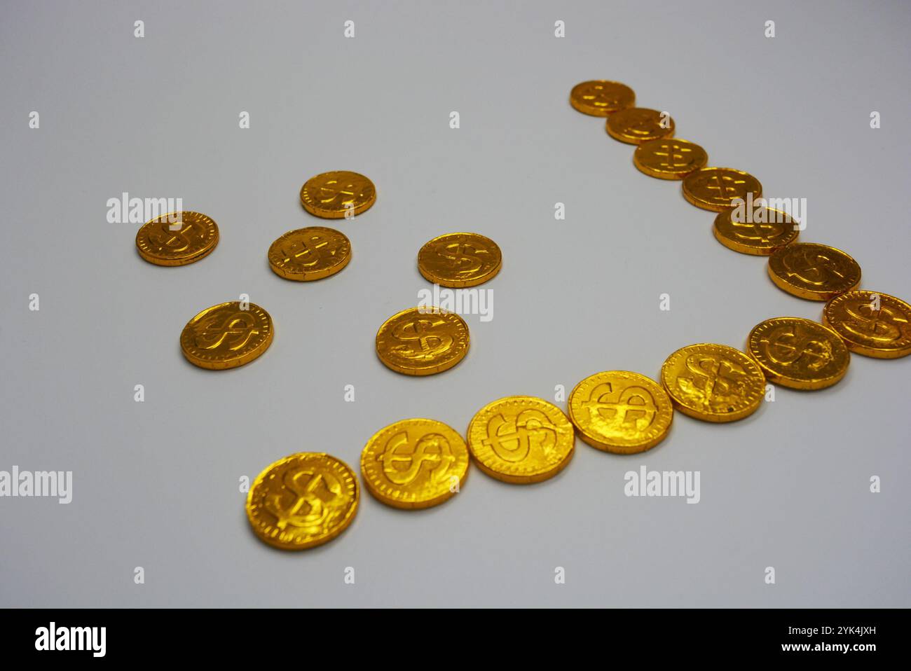 Beautiful, large gold coins, cents with a dollar $ sign are located on ...