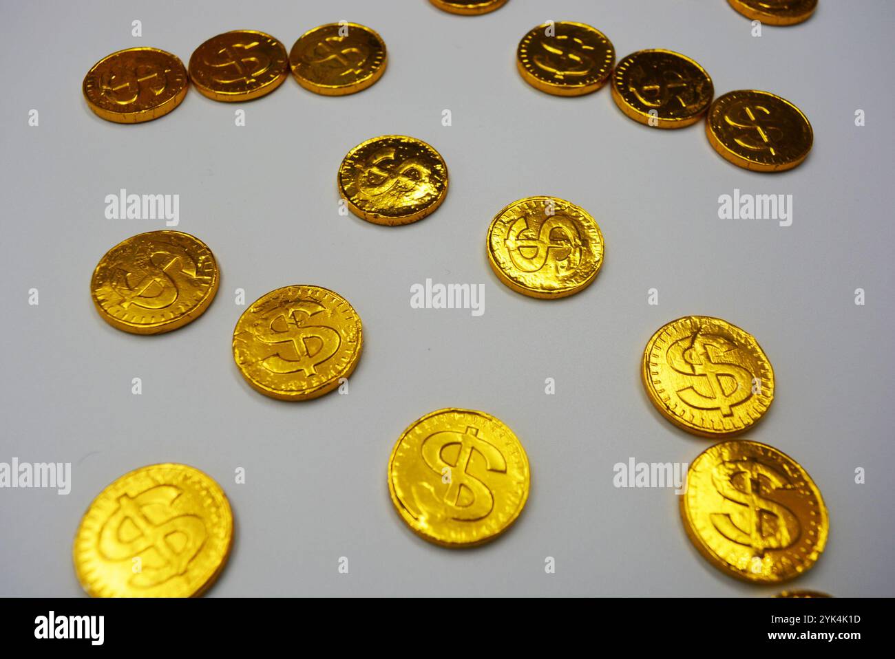 Beautiful, large gold coins, cents with a dollar $ sign are located on ...