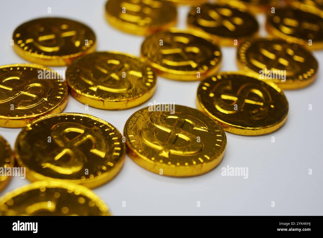 Beautiful, large gold coins, cents with a dollar $ sign are located on ...