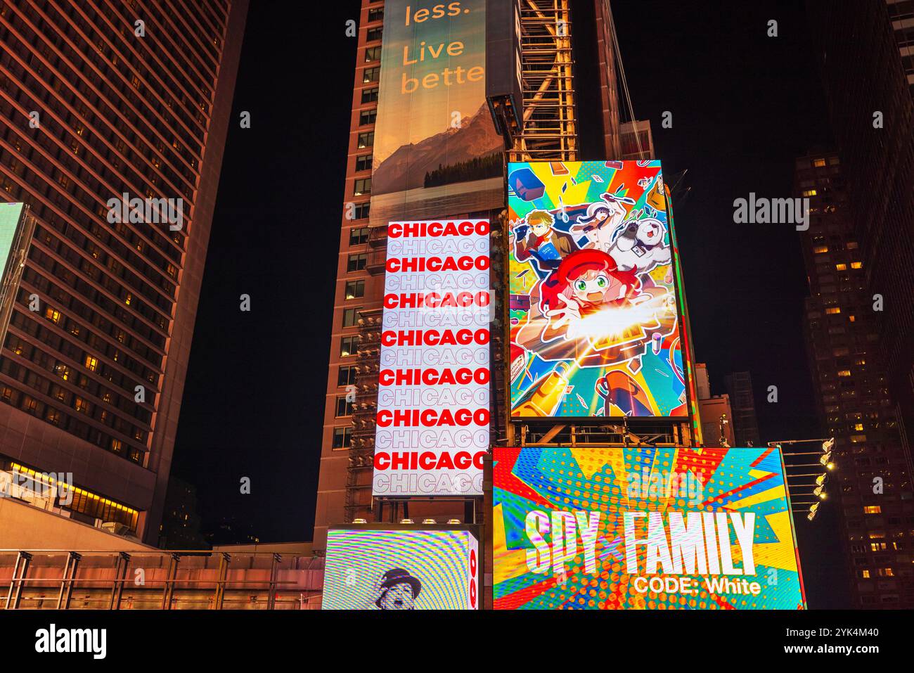 Bright illuminated billboards at night in Times Square featuring ...