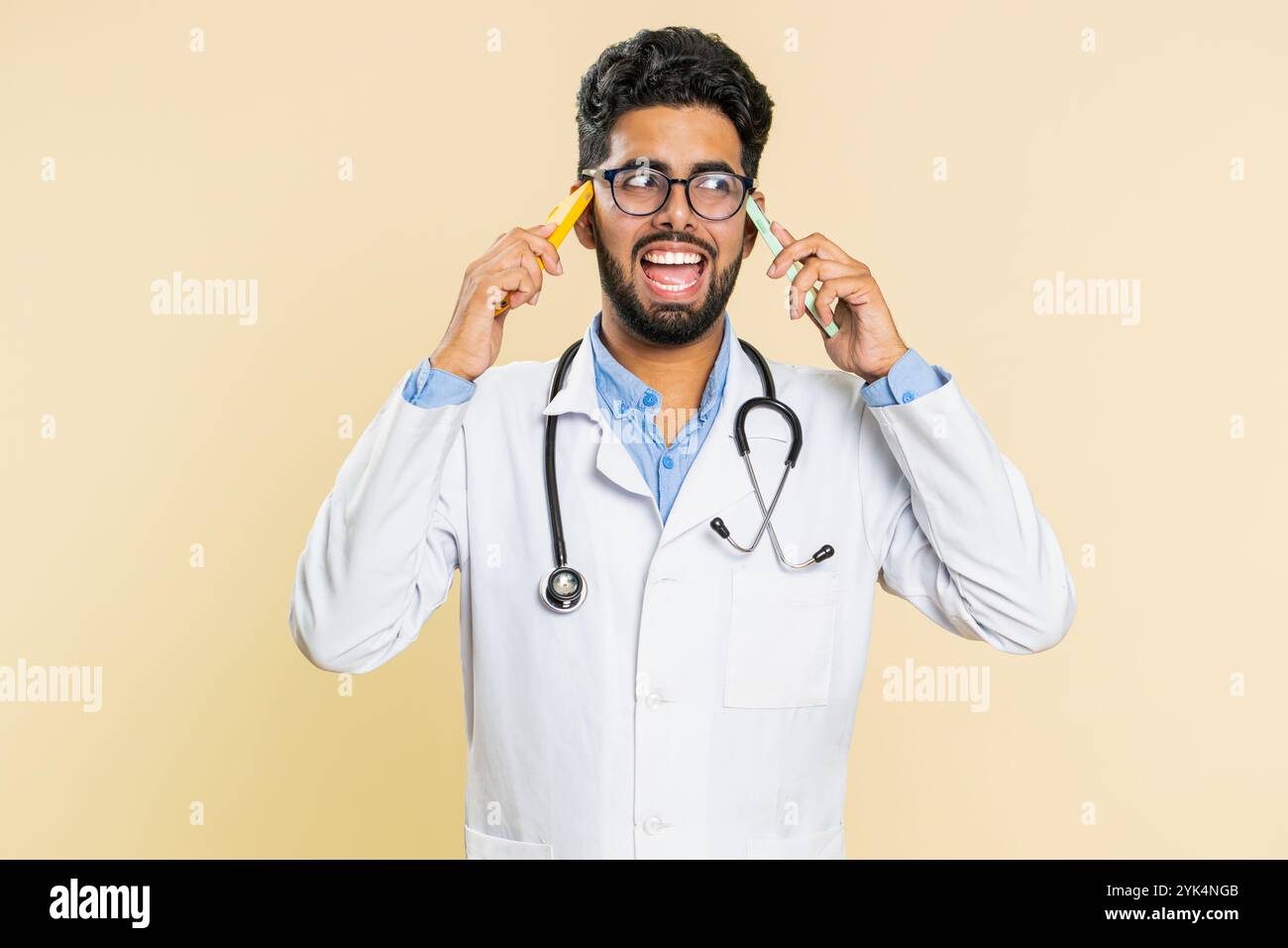 Irritated nervous stressed tired Indian doctor cardiologist man talking ...