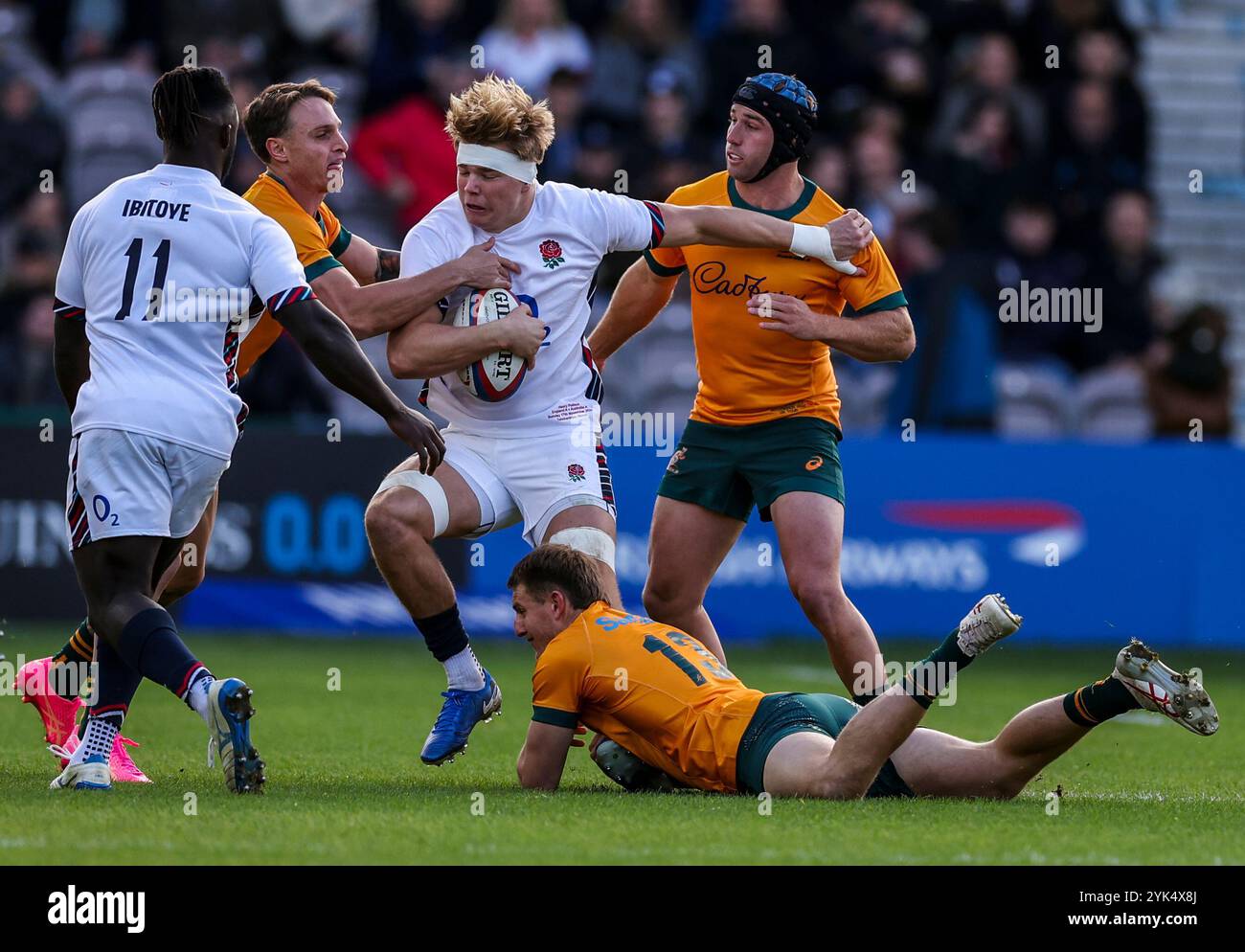 England A's Henry Pollock tackled by Australia's Darby Lancaster during ...