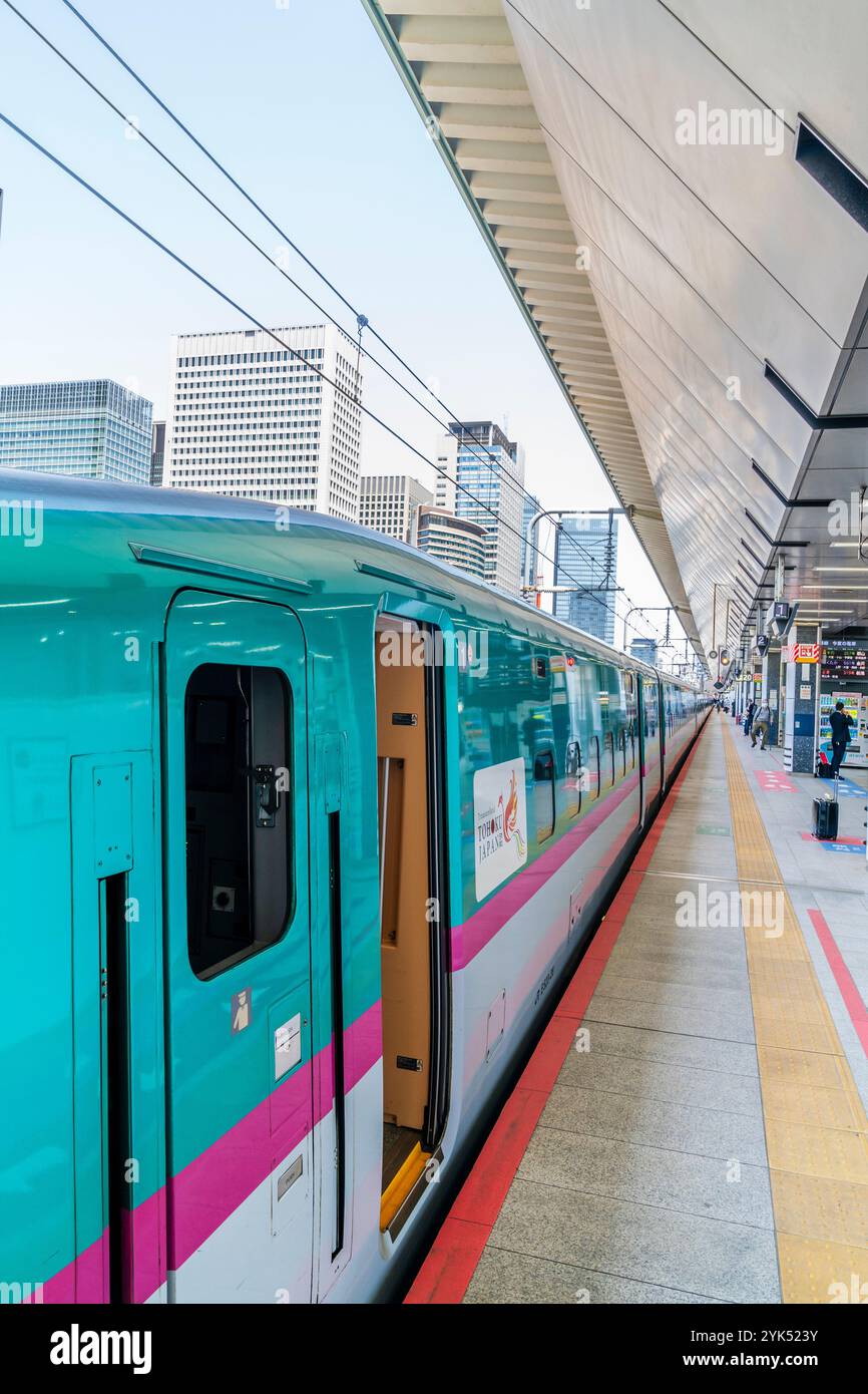 View along an E5 series Tohoku Shinkansen bullet train at the platform ...