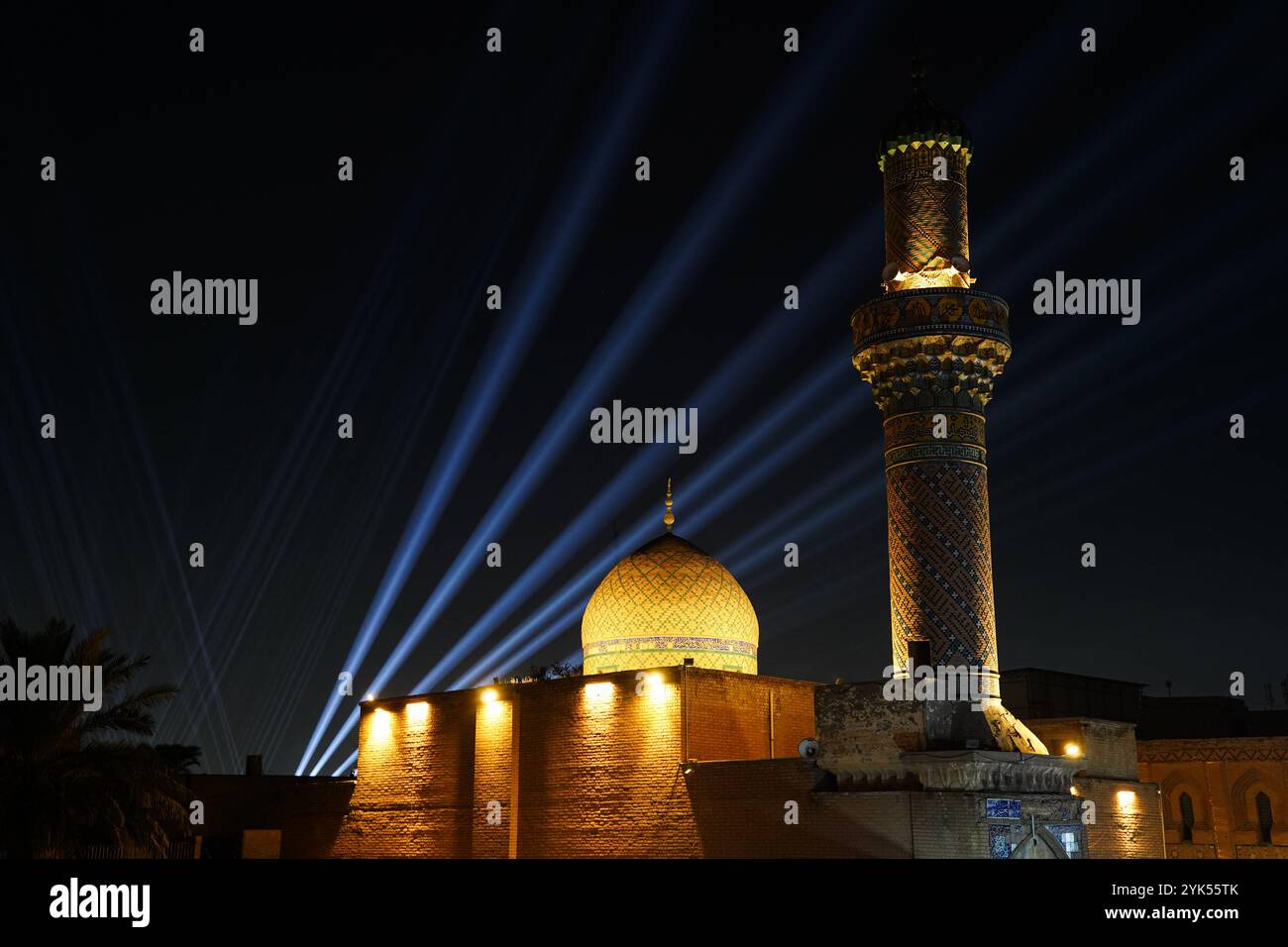 Lights illuminate Al-Wazir Mosque in old Baghdad during the Baghdad Day Festival. Baghdad Day ...