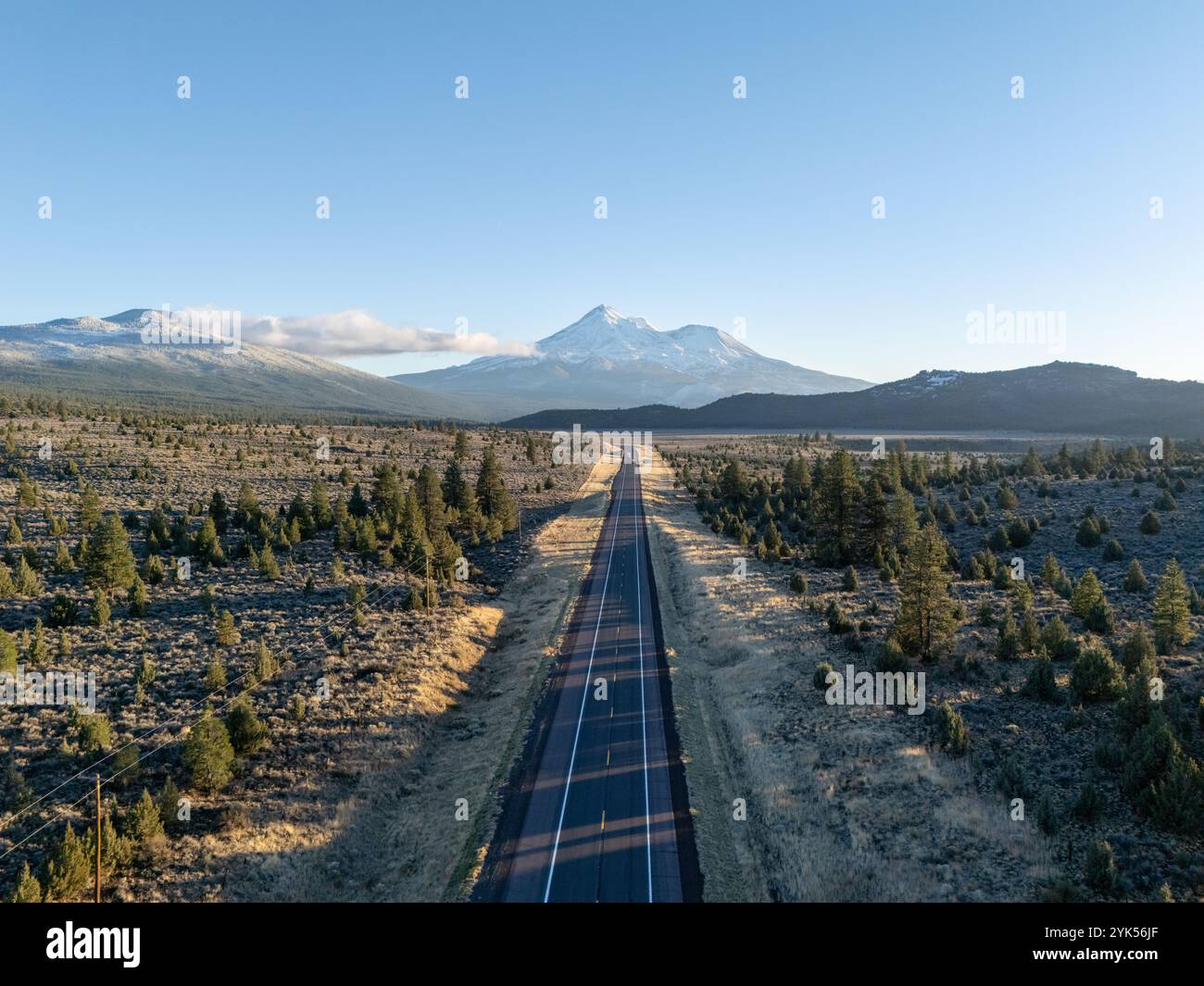 Aerial view of Mount Shasta from above route 97, California, at sunset ...