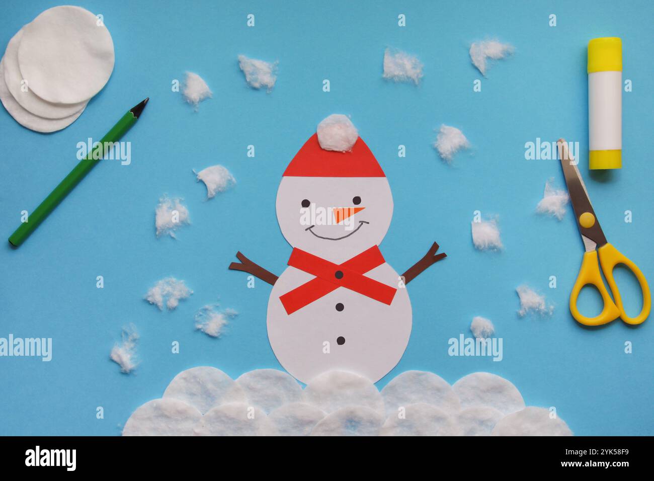 Crafts for children. Winter decoration from paper and cotton disk ...