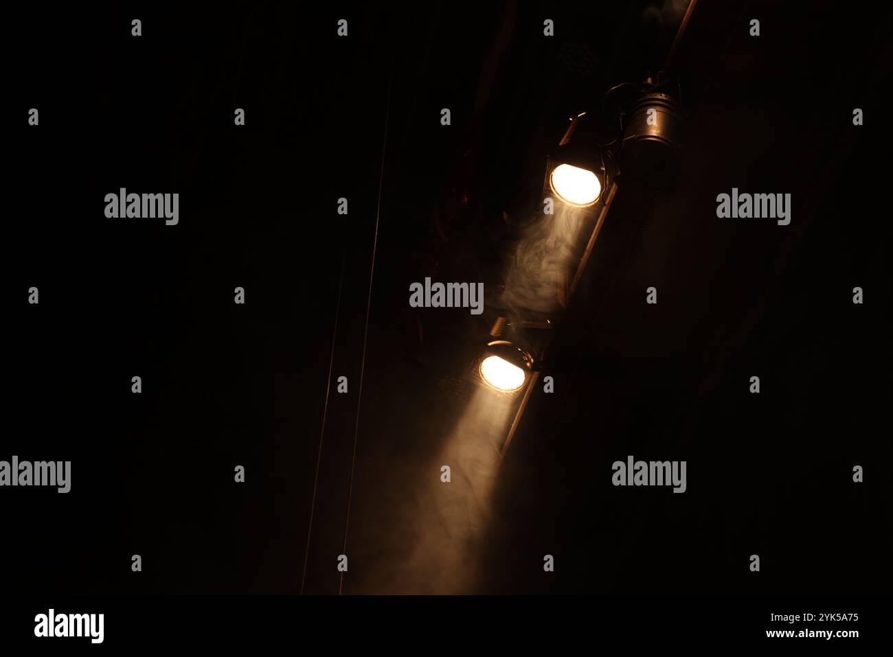 Professional spotlights and smoke on stage in theatre Stock Photo - Alamy